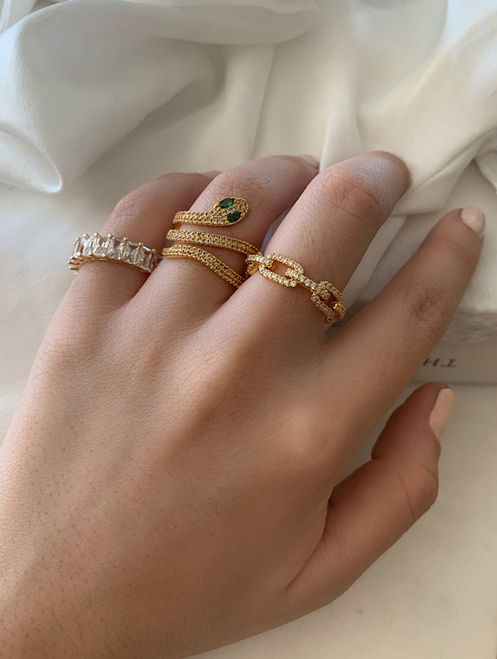 Gold snake ring with green eyes store